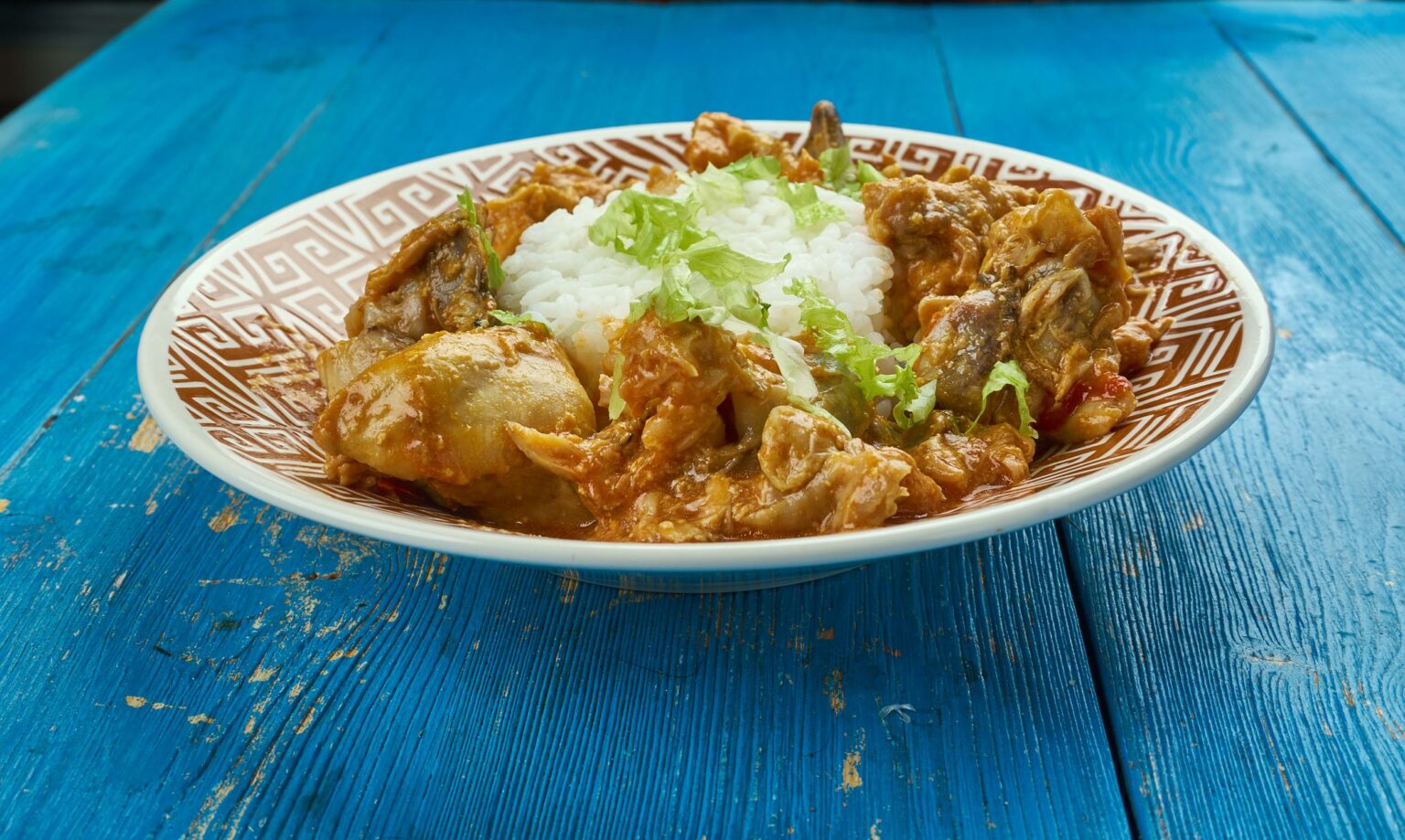 Origine du colombo : histoire d’un plat antillais iconique